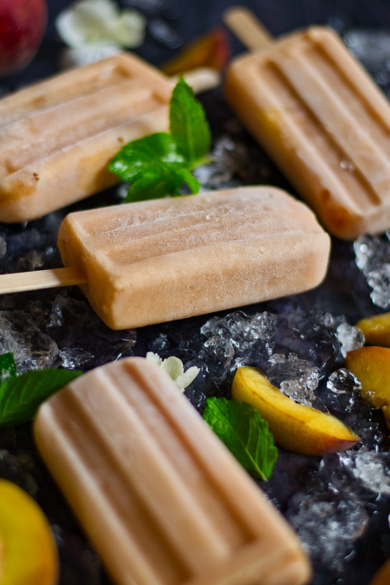 Homemade Creamy Peach Popsicles - Pretty Domesticated
