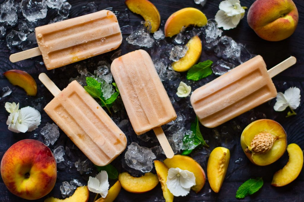 Homemade Creamy Peach Popsicles - Pretty Domesticated